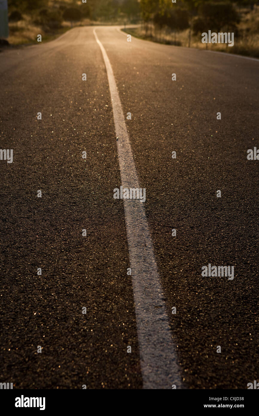 A long white line on a road at Berrocalejo, Cáceres, Extremadura, Spain ...