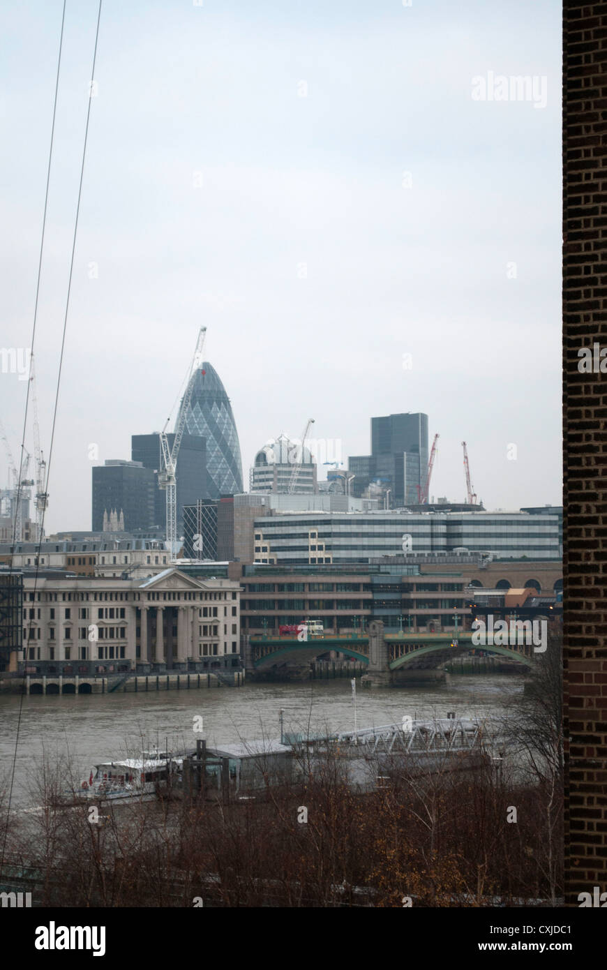 30 St Mary Axe aka The Gerkin and Southwark Bridge across the Thames ...
