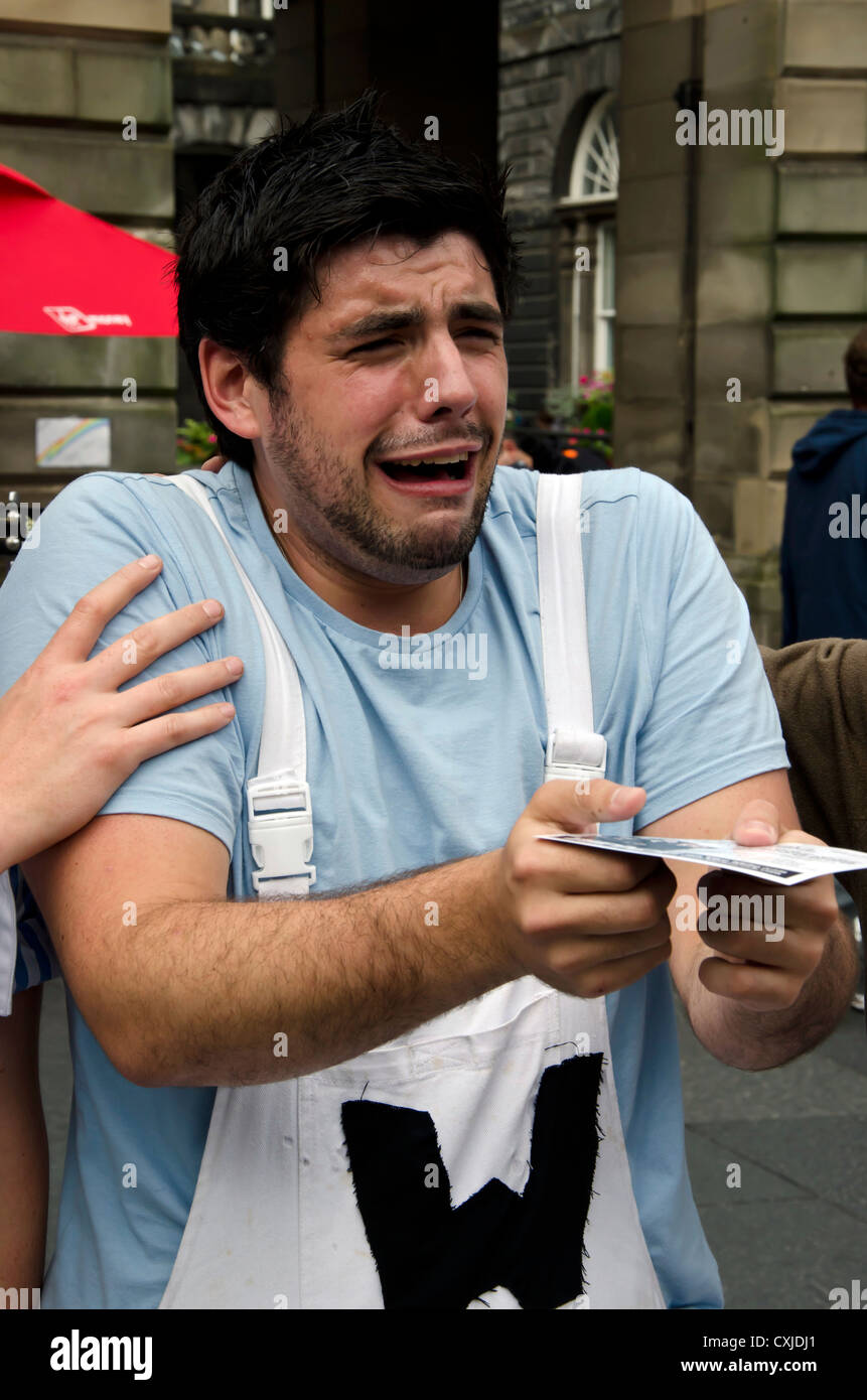"Crying" man promoting a show in the Edinburgh Festival Fringe ...