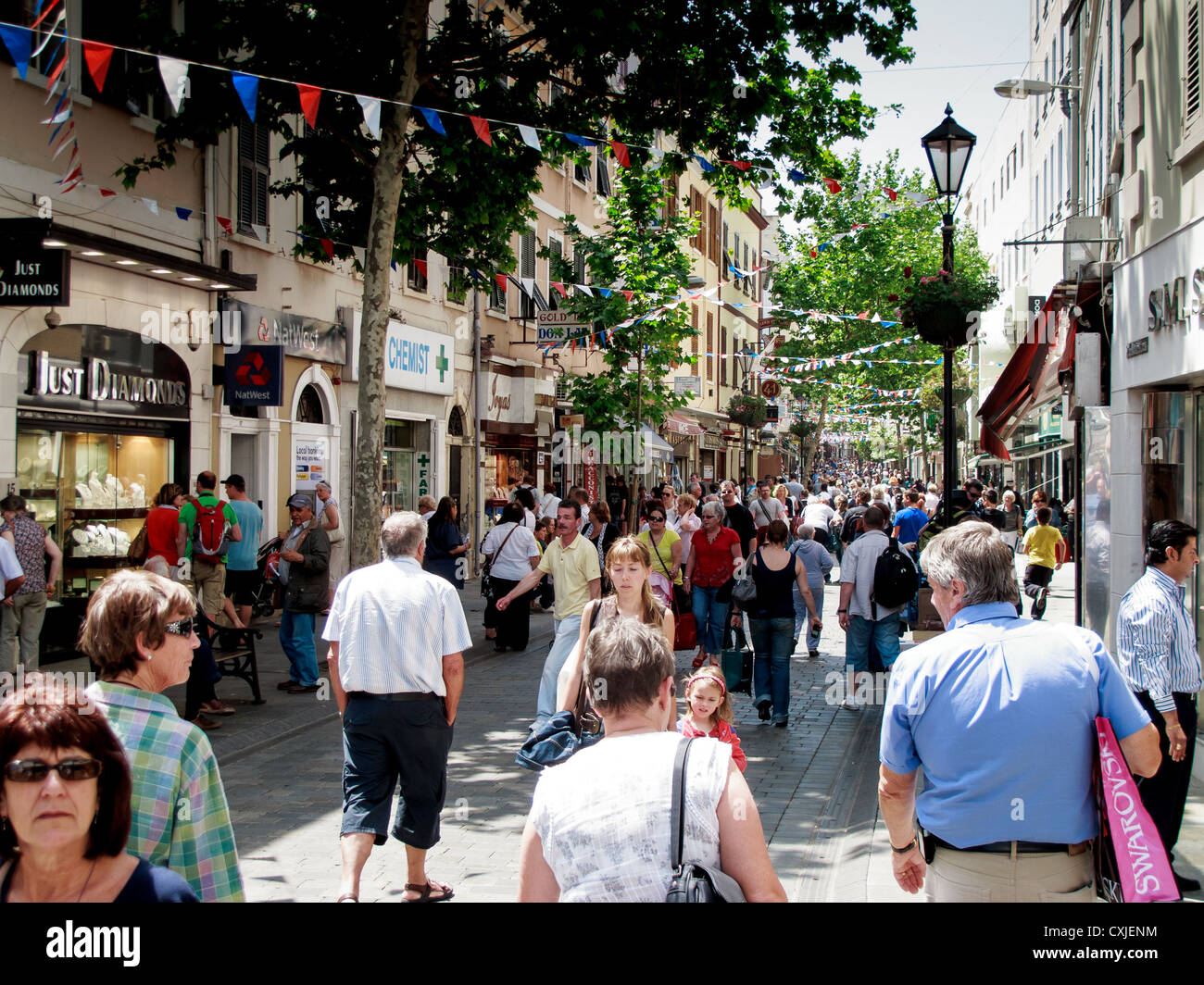 Tourists walking down main street, Gibraltar Stock Photo - Alamy