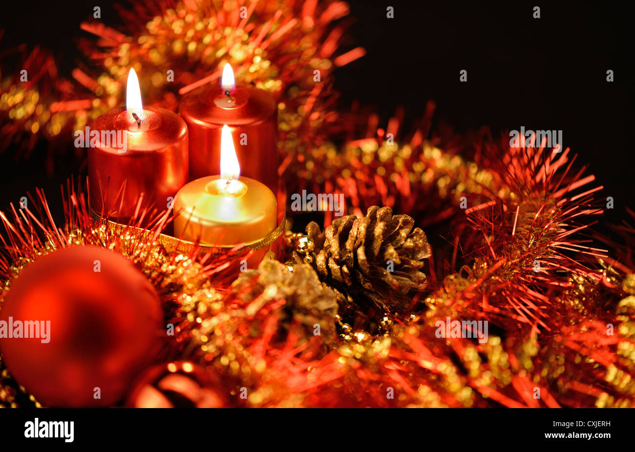 Festive decorations with candles. The color red Stock Photo - Alamy