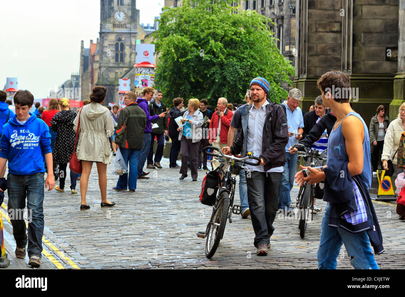 People walking along the Royal Mile, during the Edinburgh Fringe ...