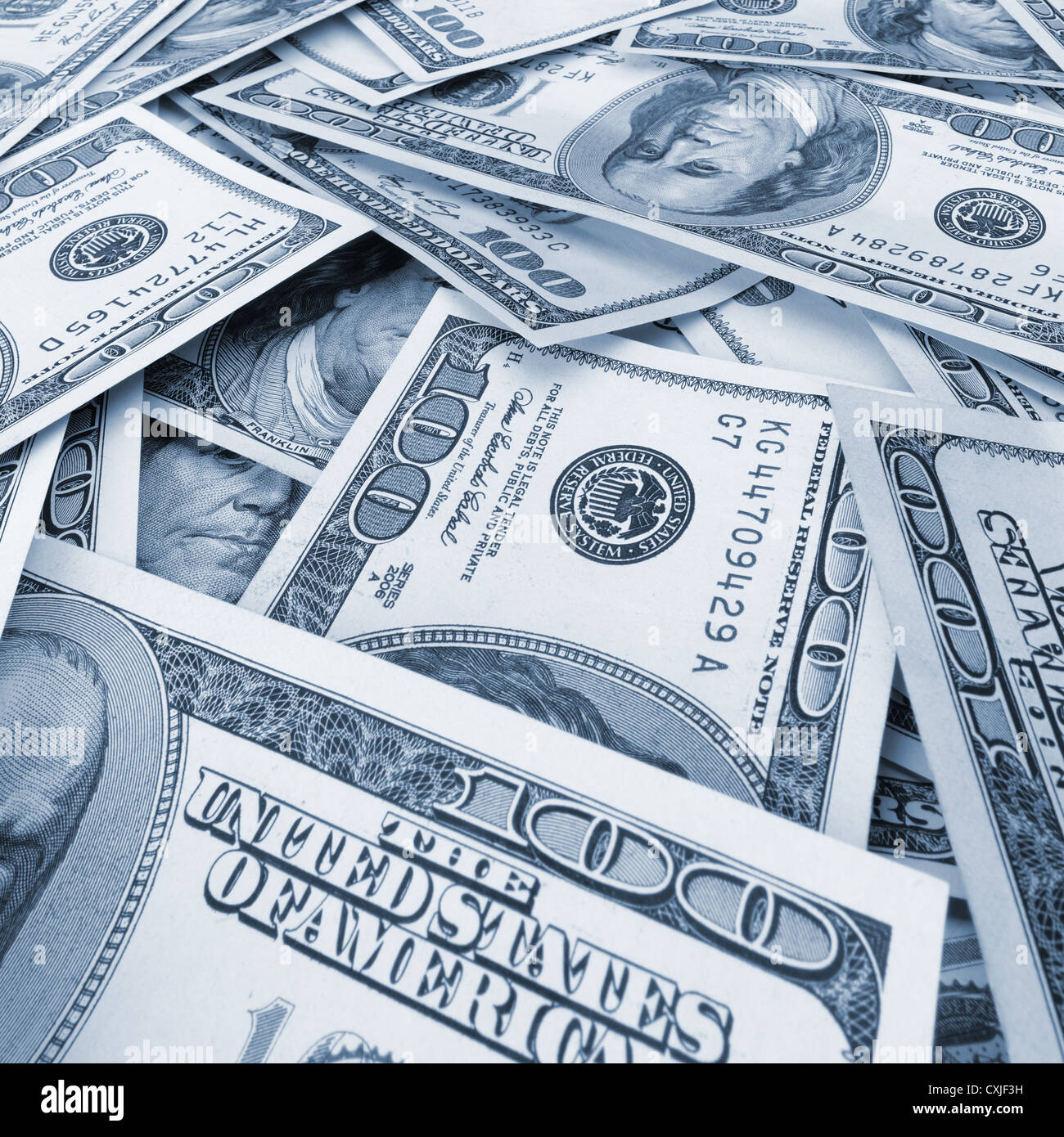 A lot of dollars.Highly detailed picture of American money. Blue toned ...