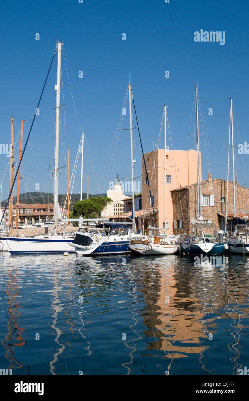Yachts a moored in the pretty marina at Port Grimaud in the south of ...