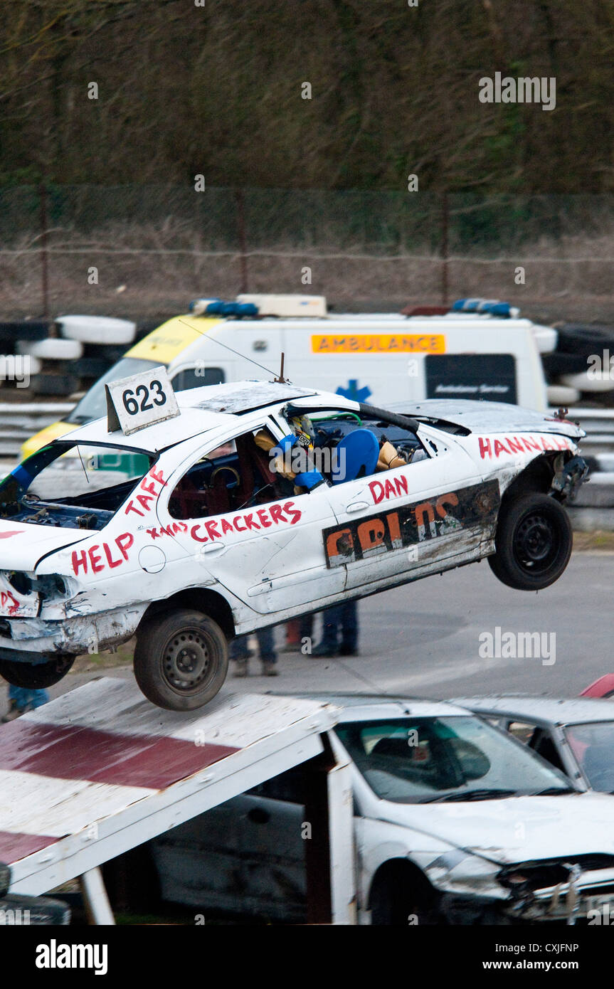 Car Jumping Over Other Cars at a Banger Race Stock Photo - Alamy