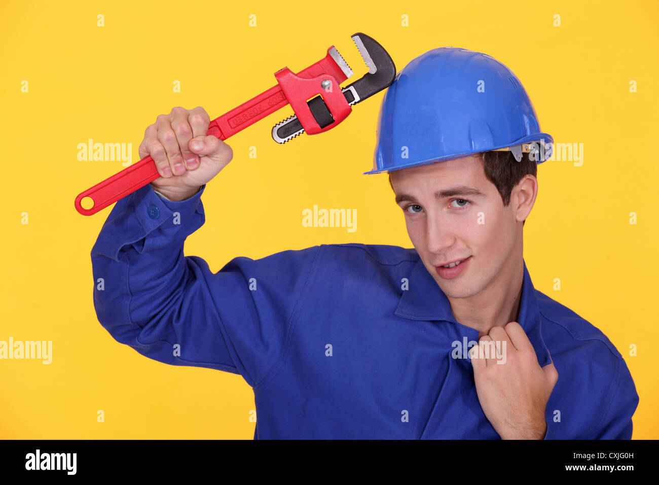 Worker with wrench Stock Photo - Alamy
