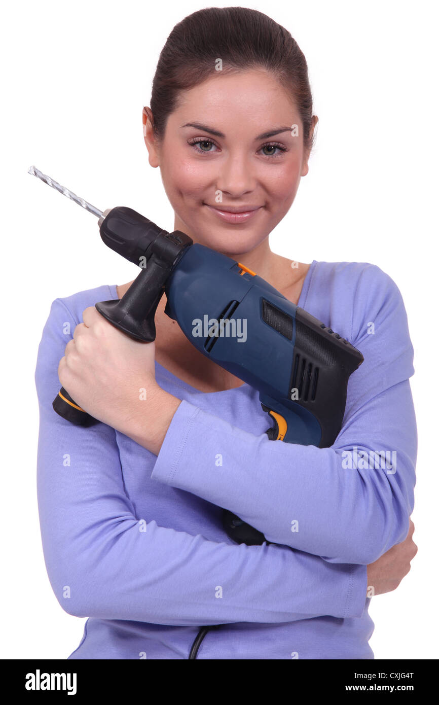 Woman with drill Stock Photo - Alamy