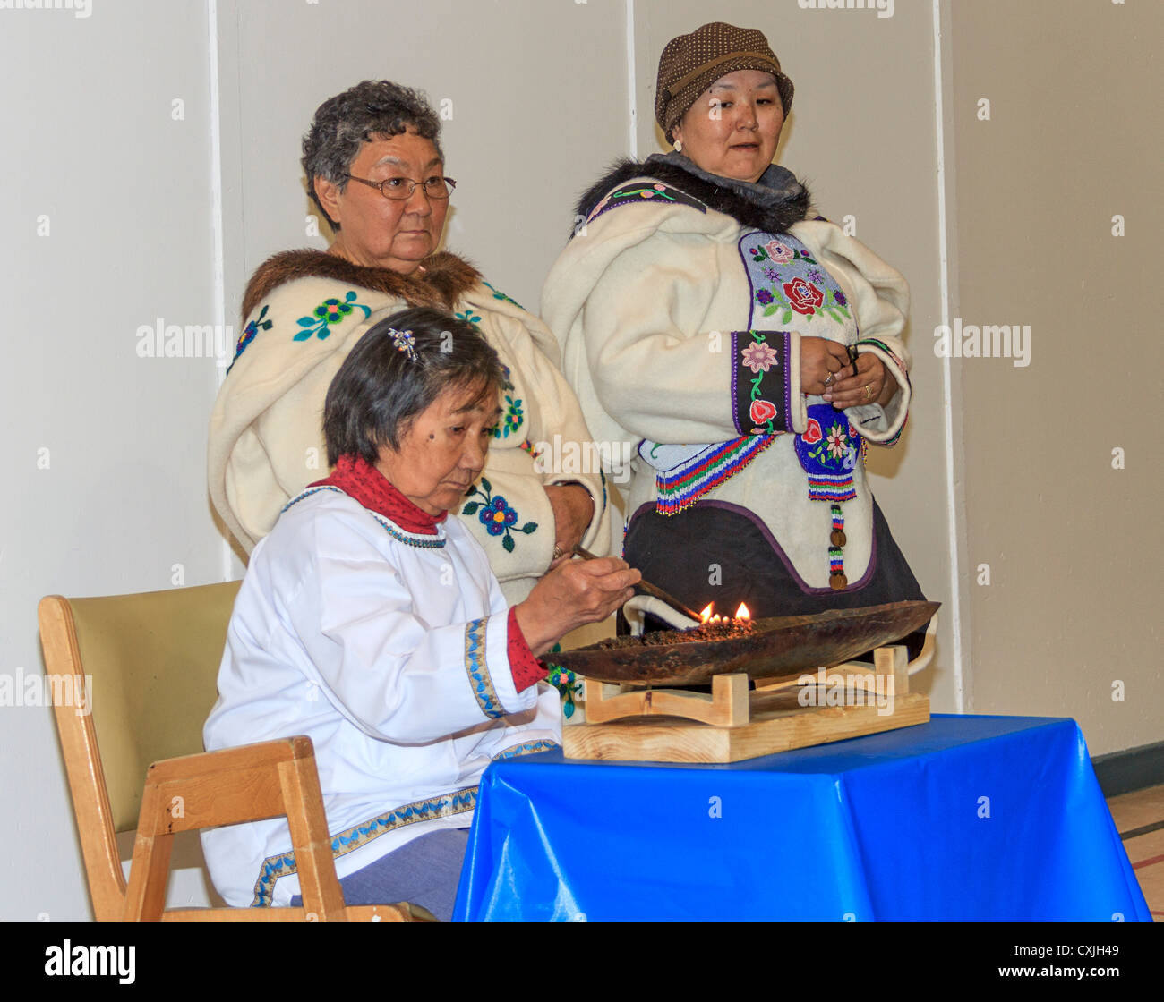 Inuit women in traditional skin clothing. Grise Fjord, Nunavut ...