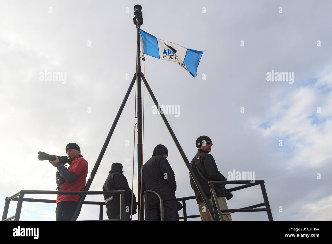 Passengers aboard Adventure Canada's cruise ship, Clipper Adventurer ...