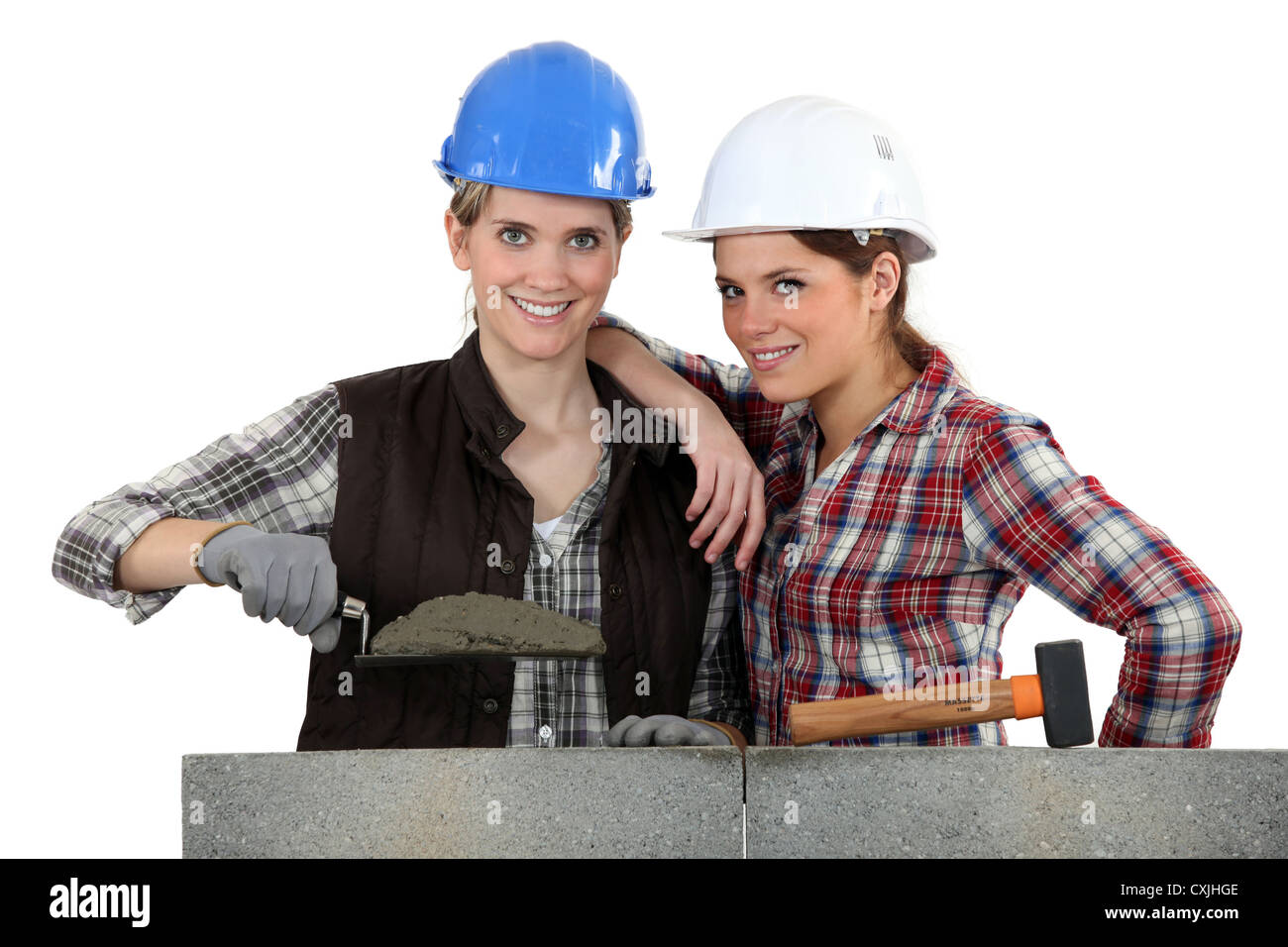 Women building wall Stock Photo - Alamy