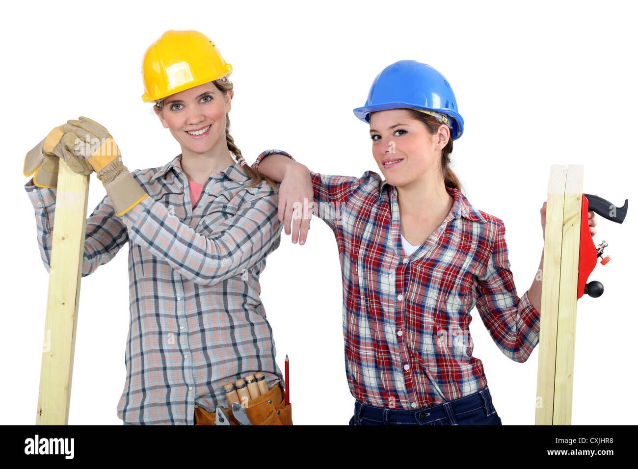 Female builders with timber Stock Photo - Alamy