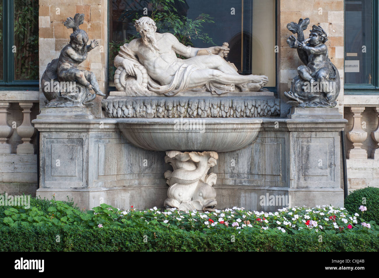 A statue in the interior square of the Town Hall in the Grand Place ...