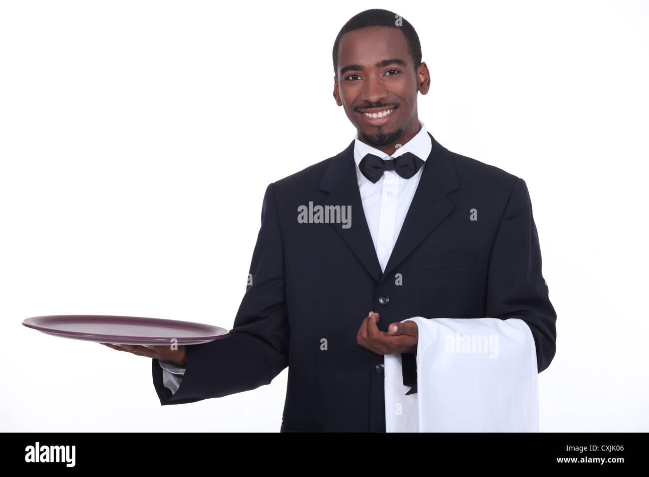well dressed black waiter Stock Photo - Alamy