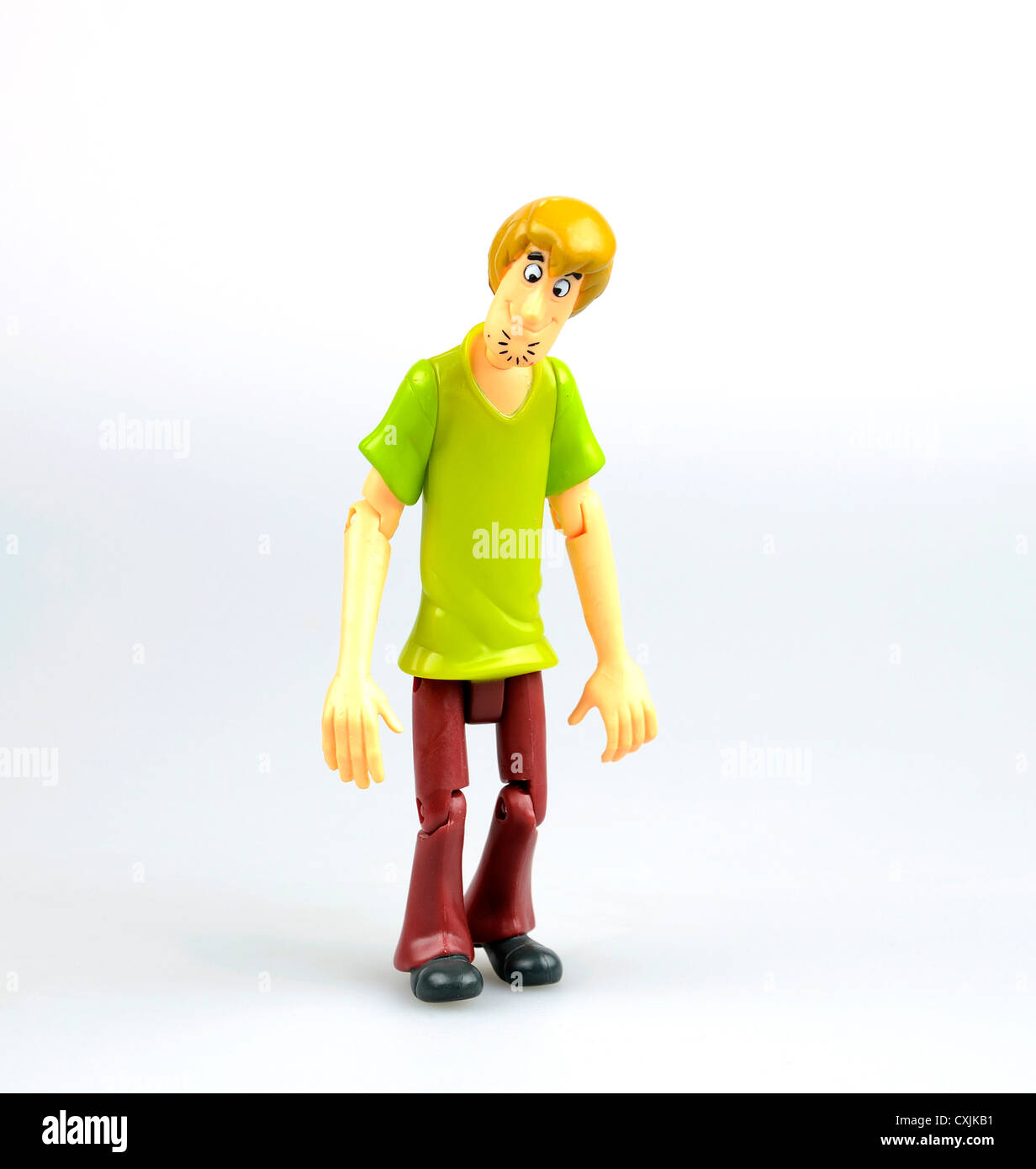 A childs toy model of " Shaggy " from the " Scooby Doo " television ...