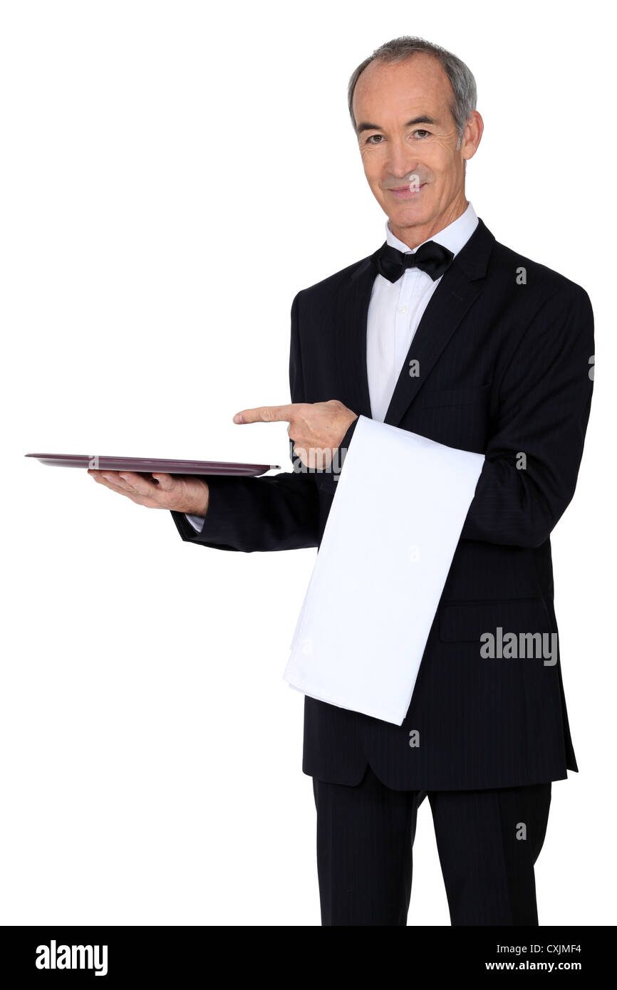 60 years old waiter showing his trail Stock Photo - Alamy