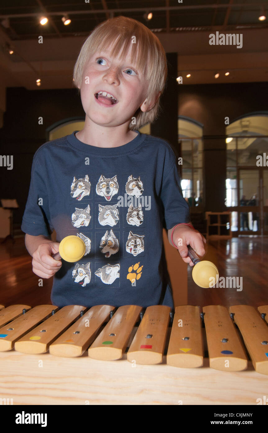 Boy playing the glockenspiel Stock Photo - Alamy