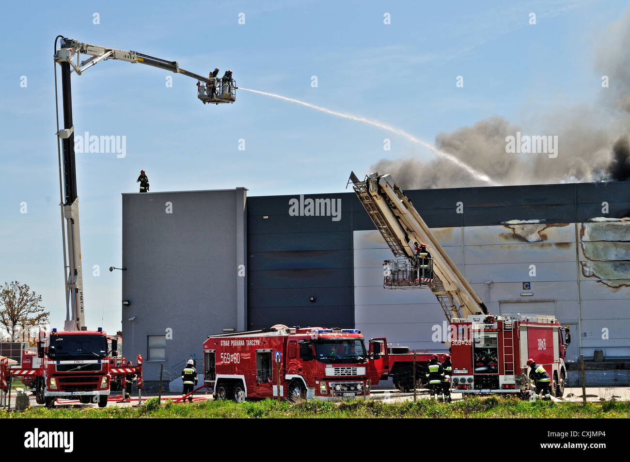 Fire truck pumping water hi-res stock photography and images - Alamy