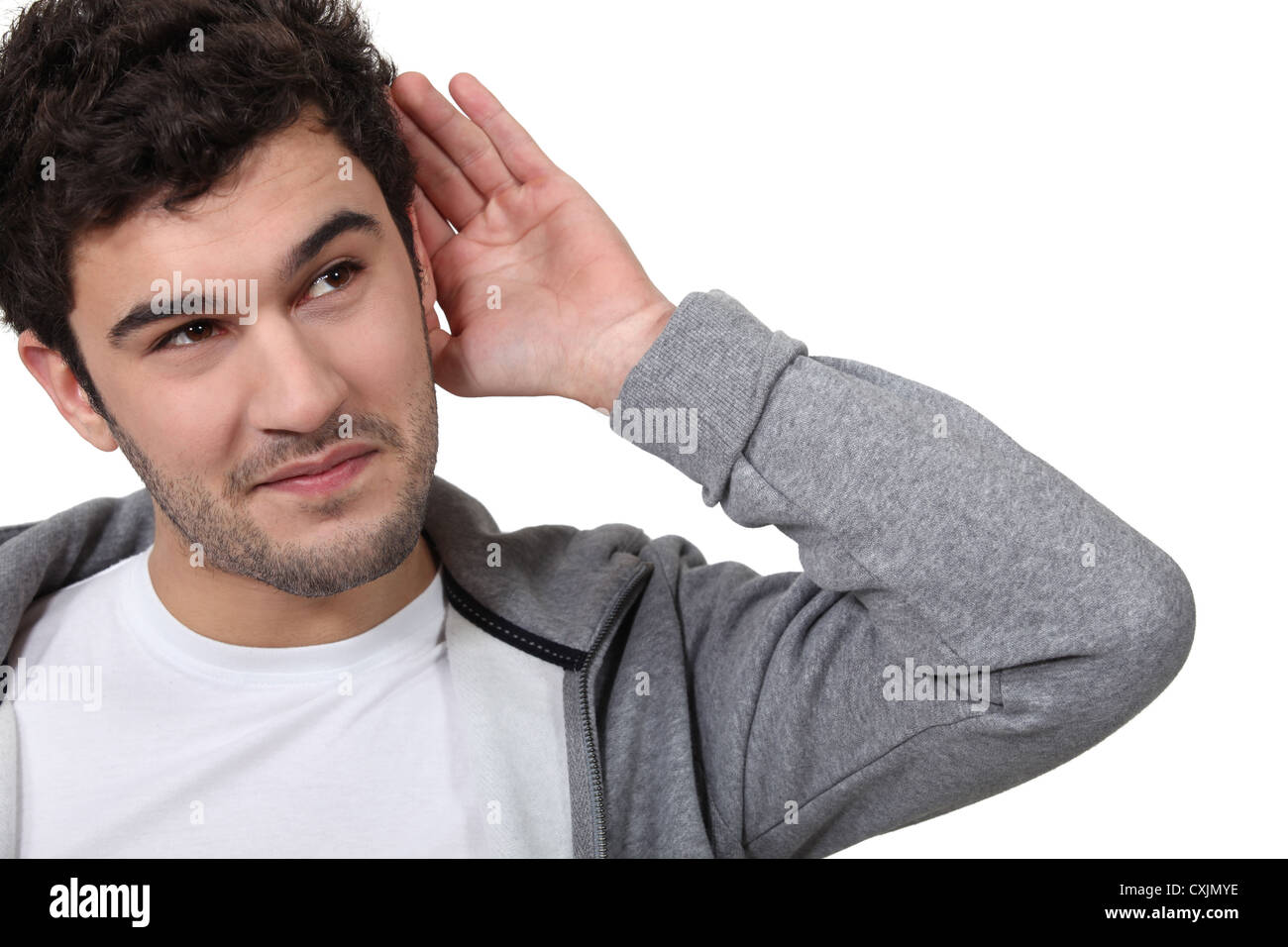 young man eavesdropping Stock Photo - Alamy