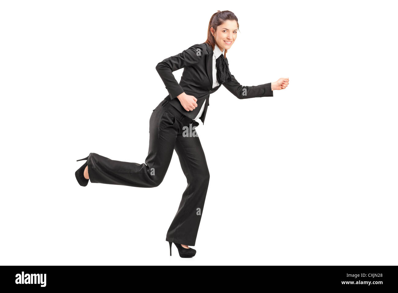 Full length portrait of a businesswoman running isolated on white ...