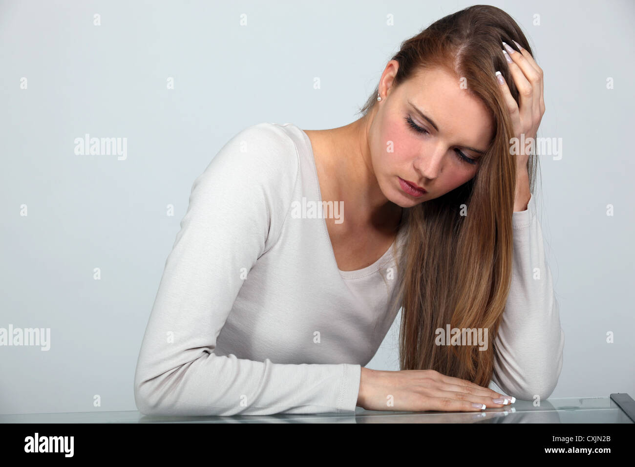 young woman in trouble Stock Photo - Alamy