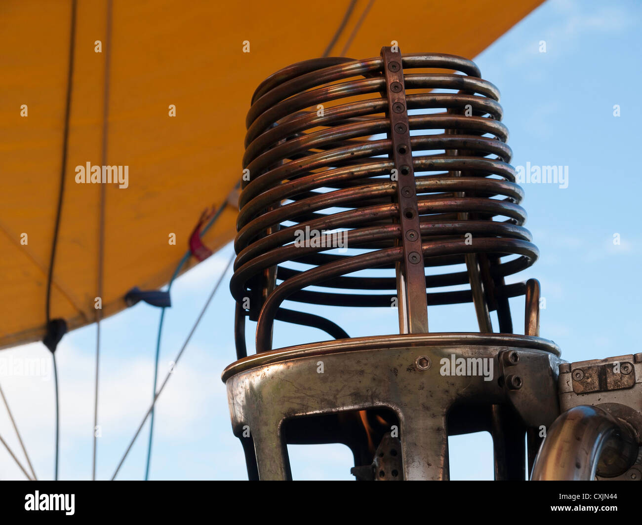 Hot air balloon gas burner, with a balloon detail Stock Photo - Alamy