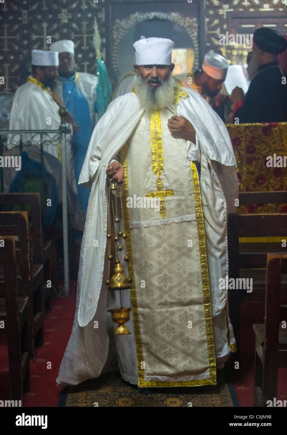 Ethiopian priest prays at the Ethiopian Church in Jerusalem , Israel ...