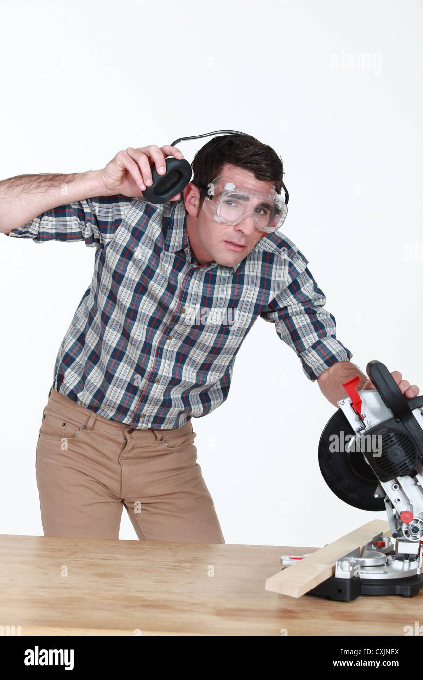 A carpenter asking to repeat Stock Photo - Alamy