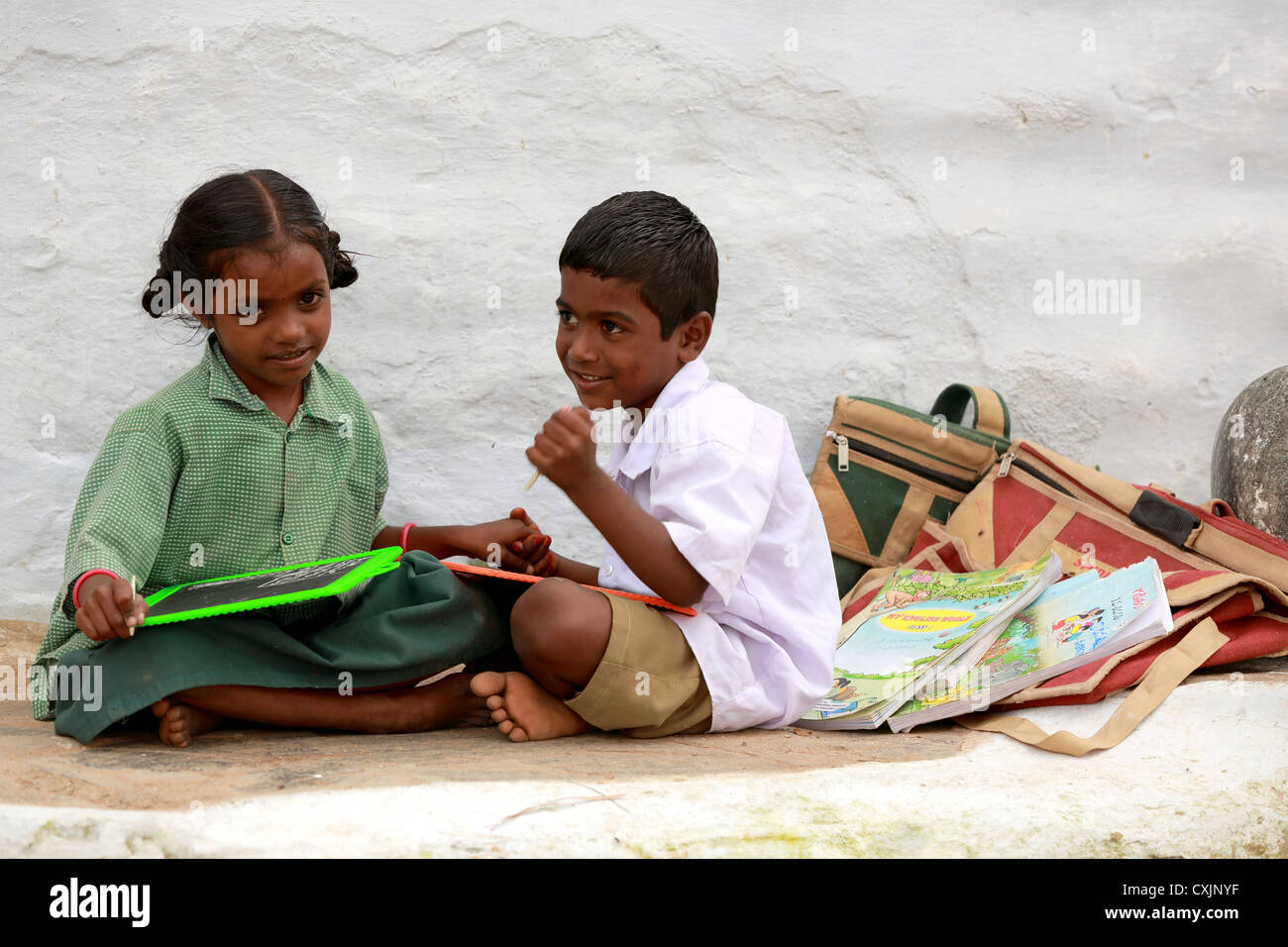 Indian school children best friends doing homework Andhra Pradesh South ...