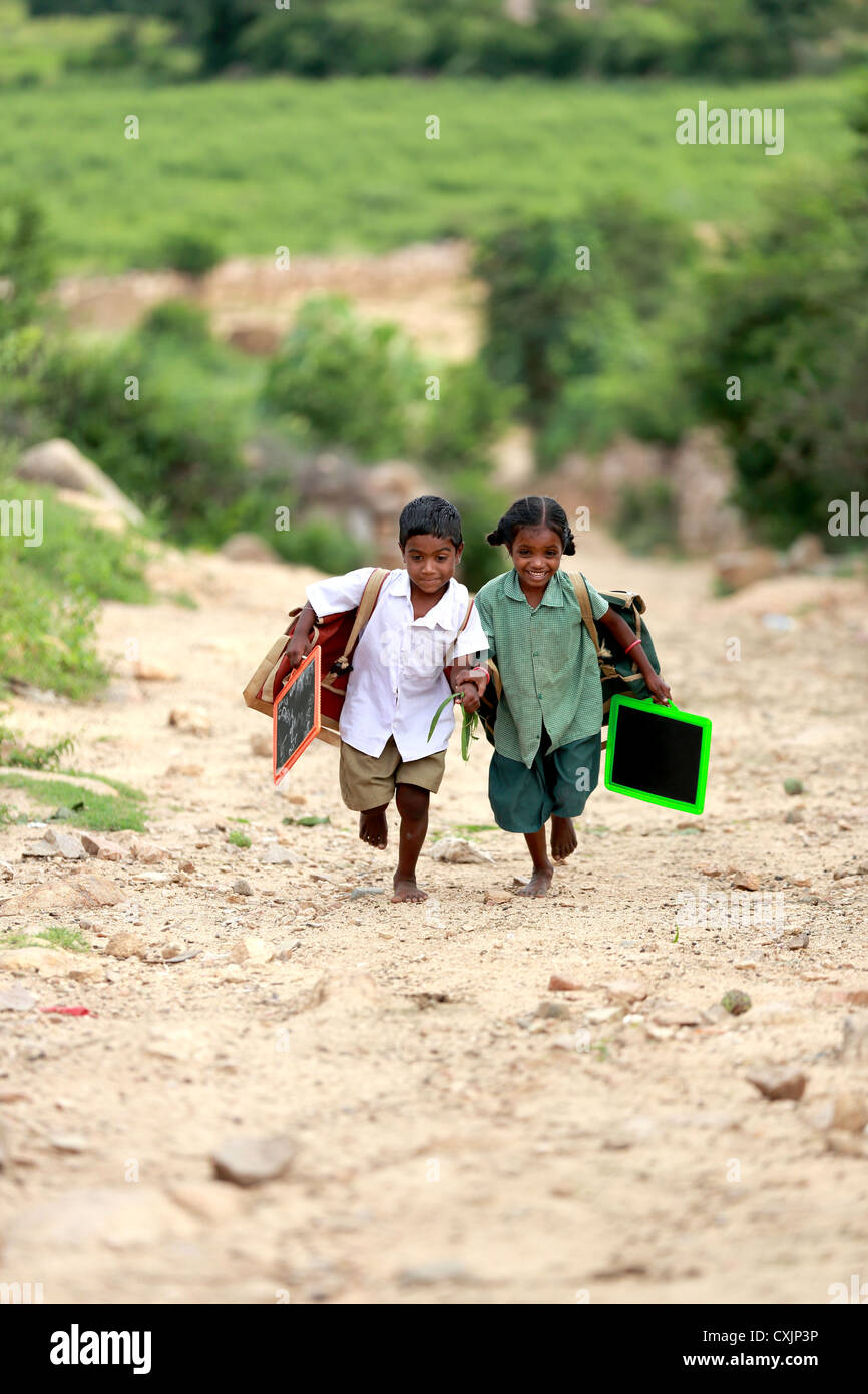 Indian school children running to go to school Andhra Pradesh South ...