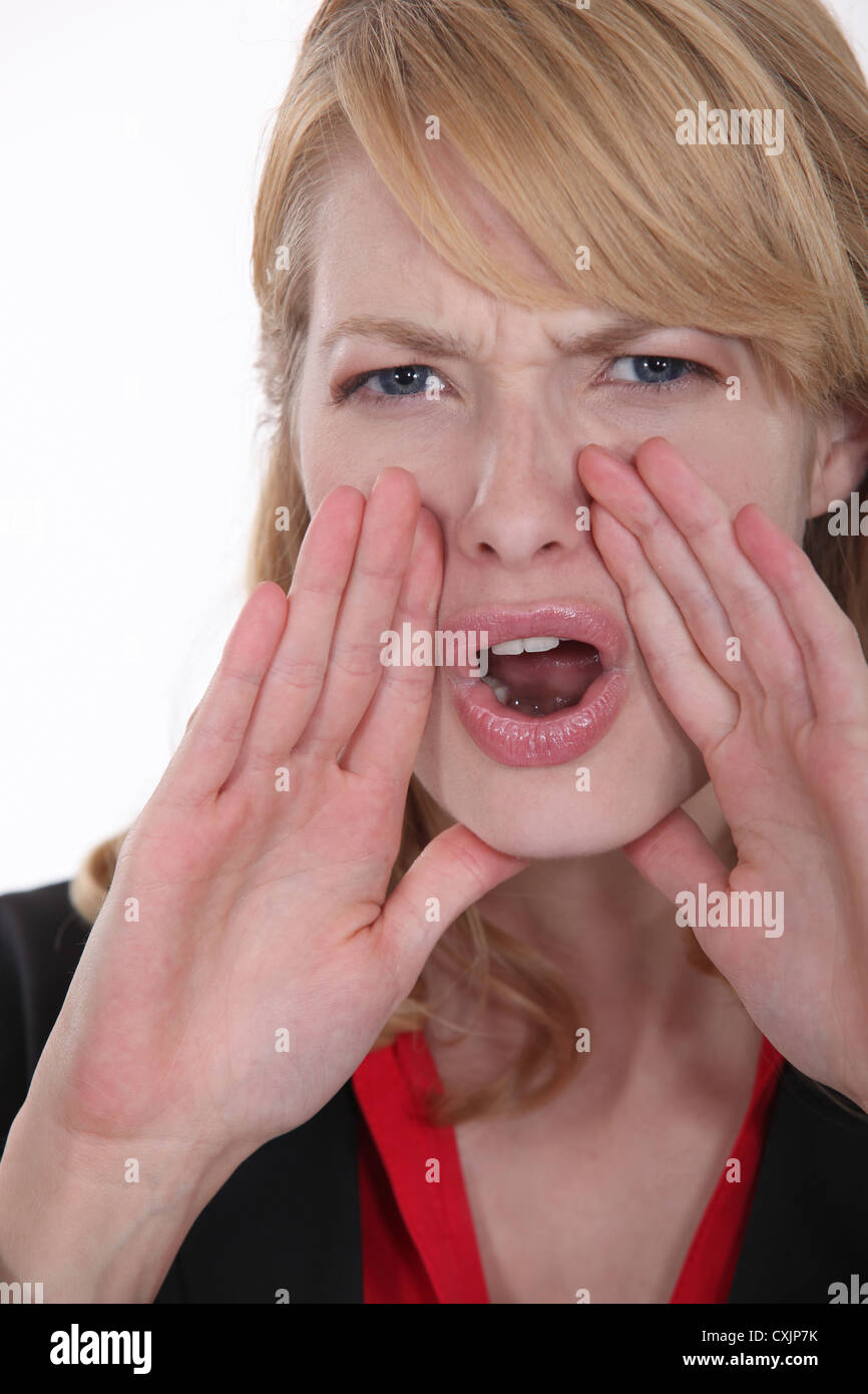 Portrait of woman screaming Stock Photo - Alamy