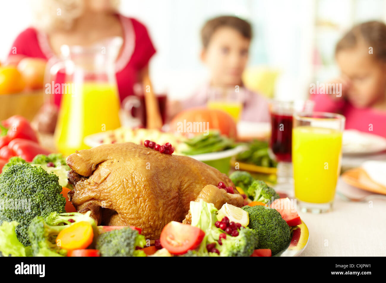 Close-up of roasted turley served with broccoli on background of ...