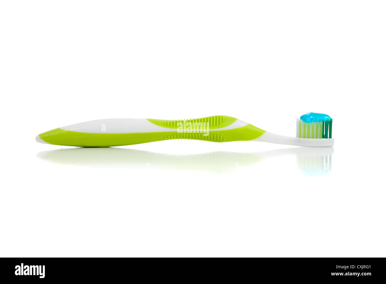 Lime green tooth brush with toothpaste on a white background Stock ...
