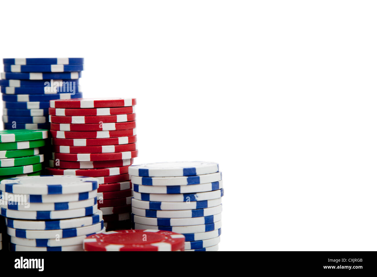 Stacks of colored poker chips on a white background with copy space ...