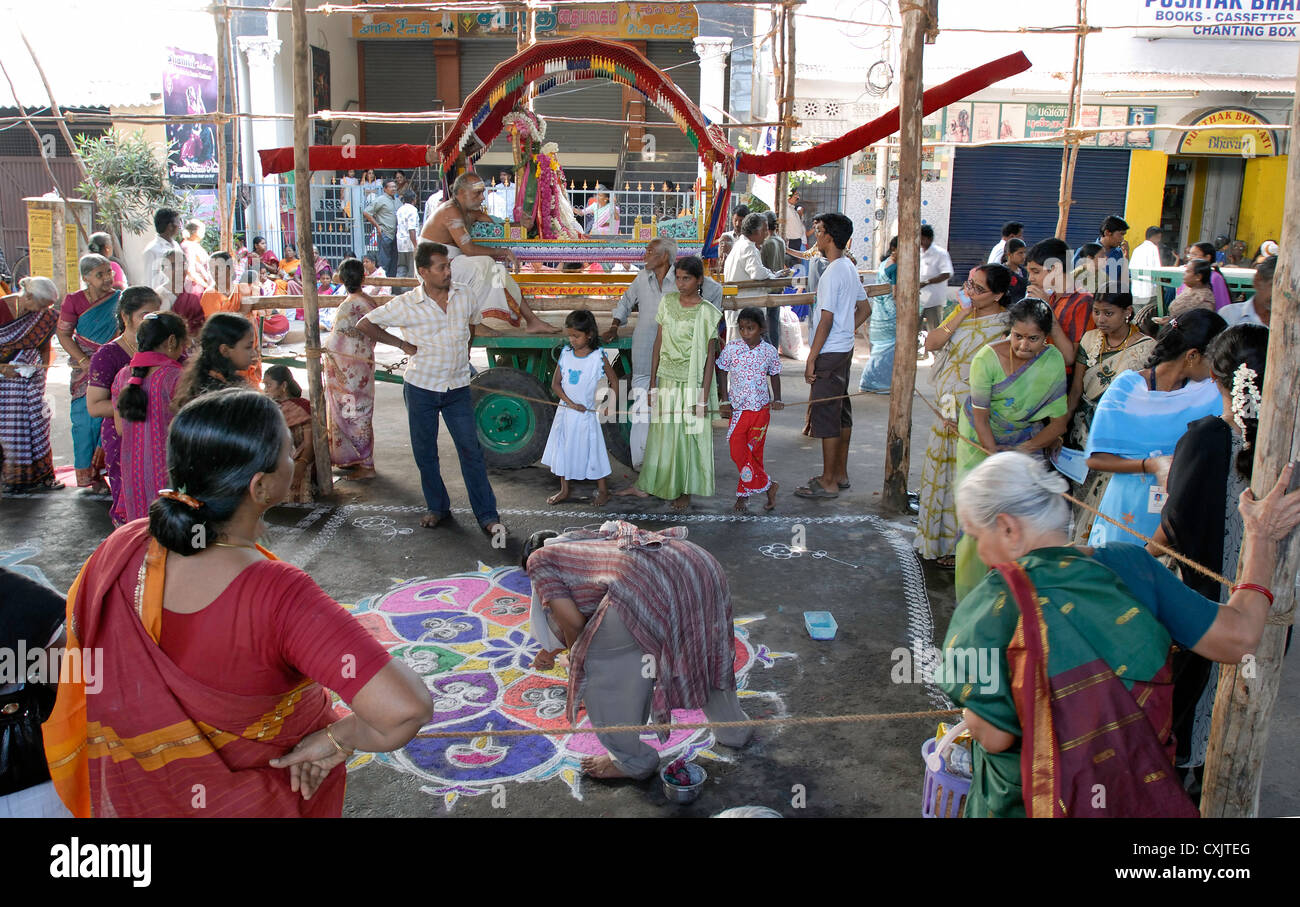 Making Kolam;Rangoli in front of kapaleeswarar temple during ...