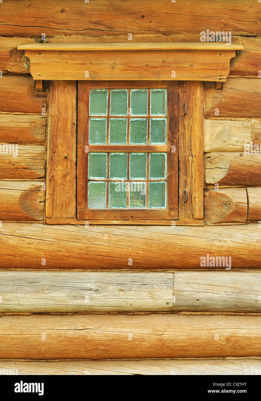 Log wall and window Stock Photo - Alamy