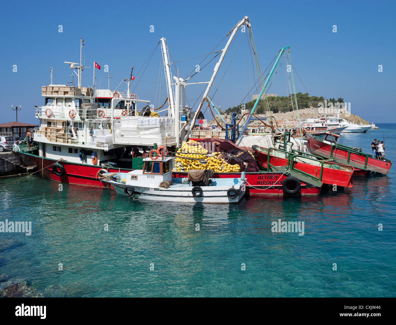 Turkish fishing boats tied up in Kusadasi (Ephesus), Turkey with Pigeon ...