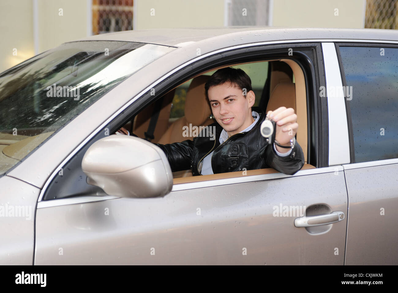 man showing the keys Stock Photo - Alamy