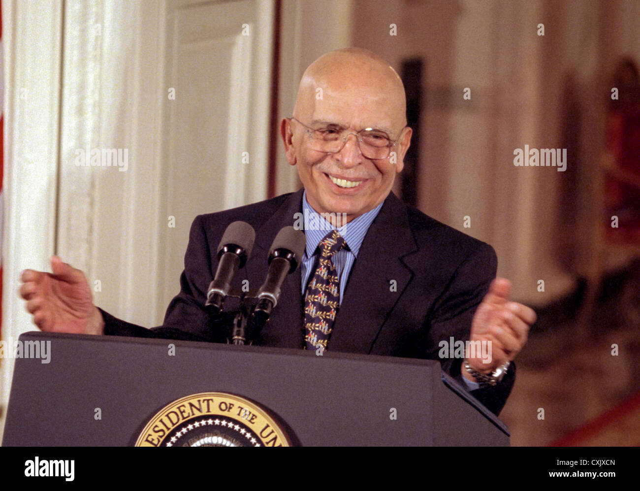 King Hussein of Jordan smiles as he makes a statement during a signing ...