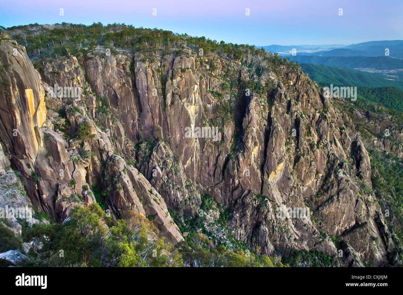 Mount Buffalo's The Gorge at dawn in a hue of purple Stock Photo - Alamy
