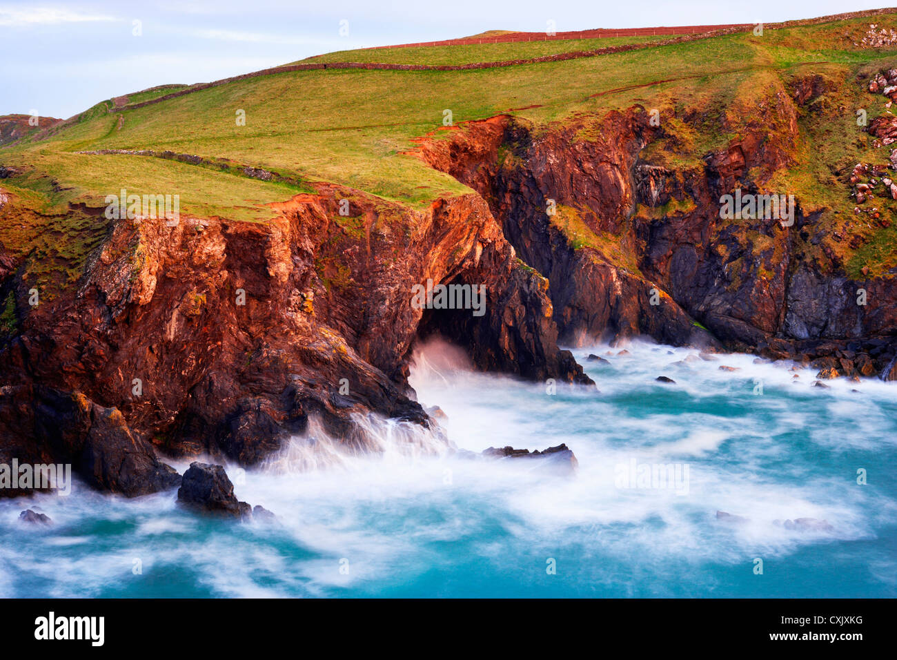Waves Breaking against Sea Cliffs with Cave, Rumps Point, Cornwall ...
