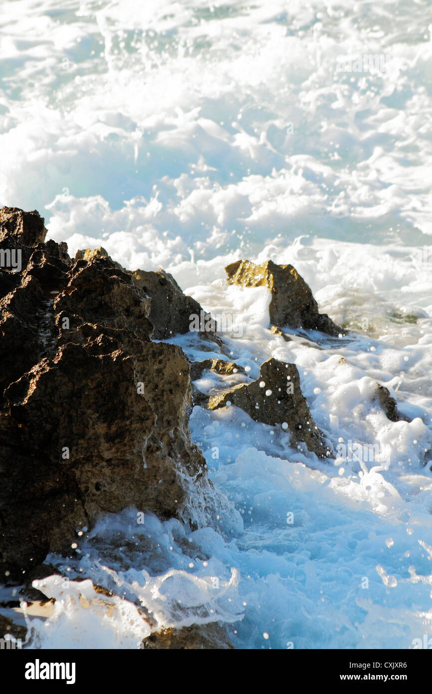 sea rock is breaking wave Stock Photo - Alamy