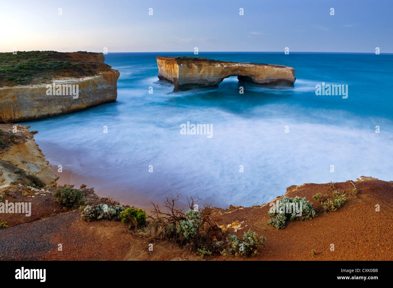 The rock formation of London Bridge at the famous Great Ocean Road ...