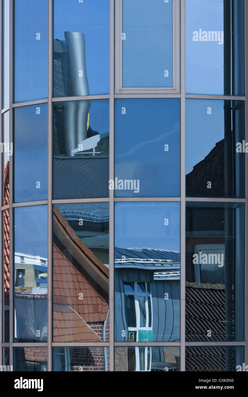 Reflection in a glass facade Stock Photo - Alamy