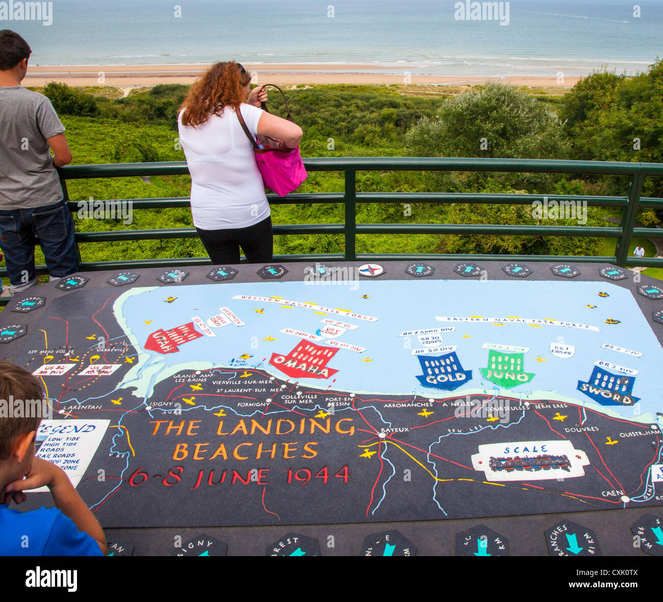 Landing beach map and people viewing it at the Normandy American ...