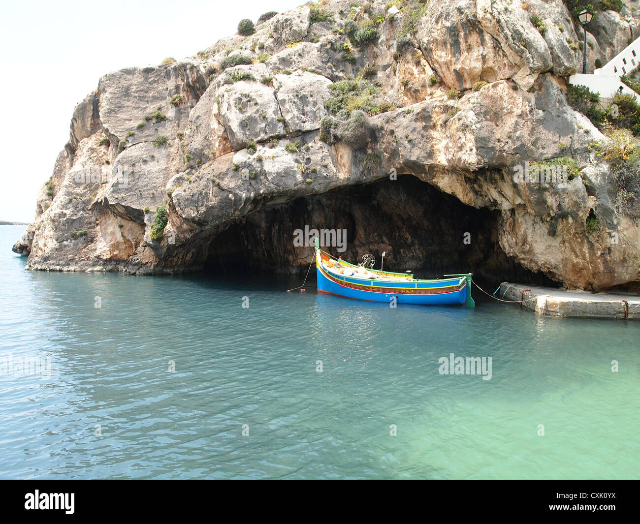 A well-kept boat in a cavern Stock Photo - Alamy
