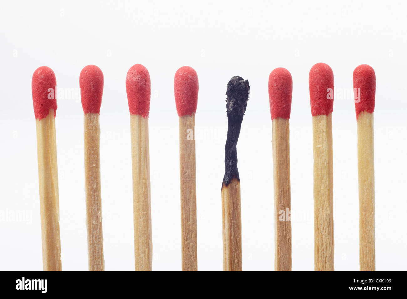Macro view of row of matches isolated over white Stock Photo - Alamy