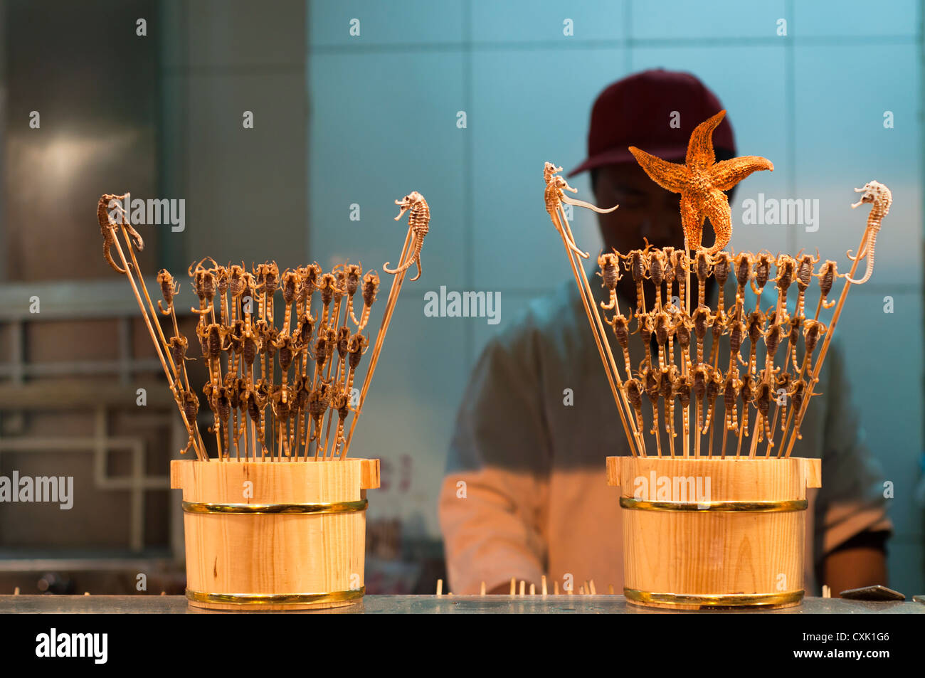 Scorpions on sticks at Wangfujing Snack Street, Beijing Stock Photo - Alamy