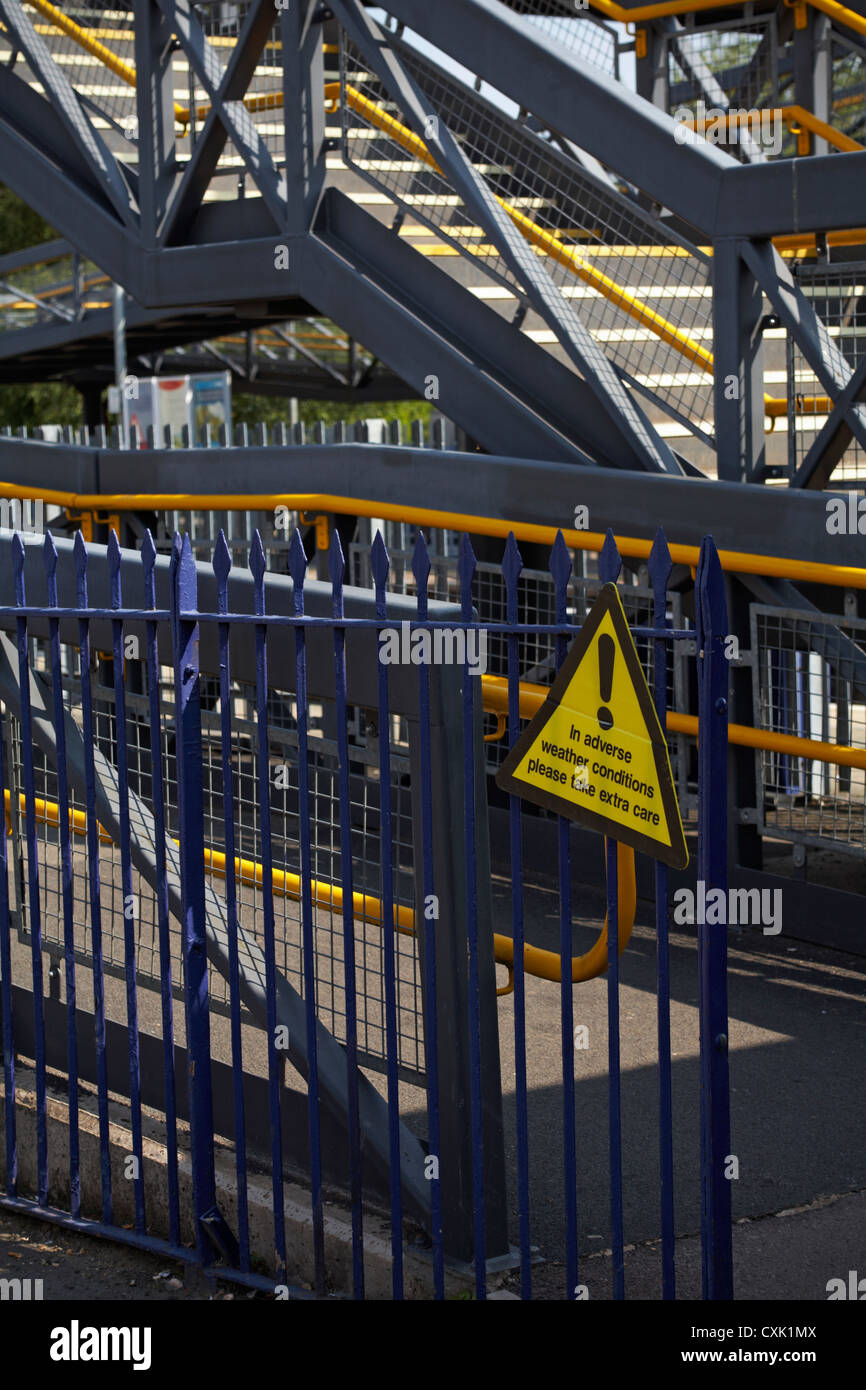 In adverse weather conditions please take extra care sign on railway ...