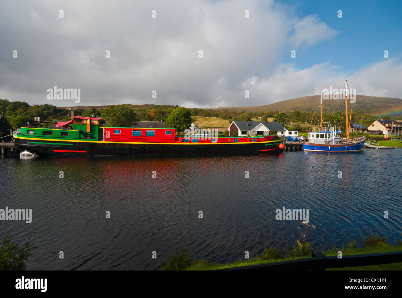 Colourful Houseboat Moored On The Caledonian Canal Near Neptunes ...