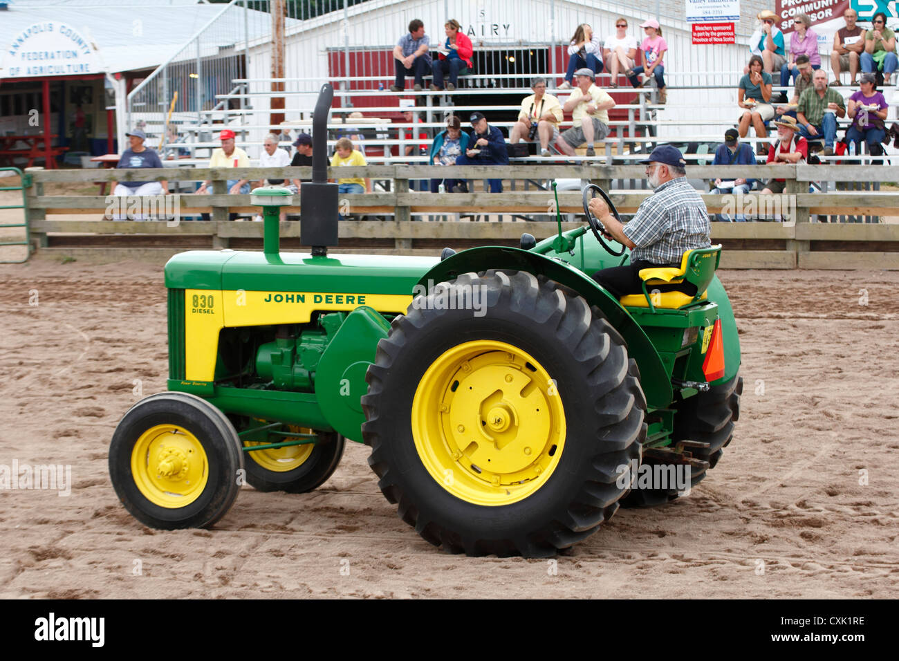 An antique John Deere 830 farm tractor in a county fair parade Stock ...